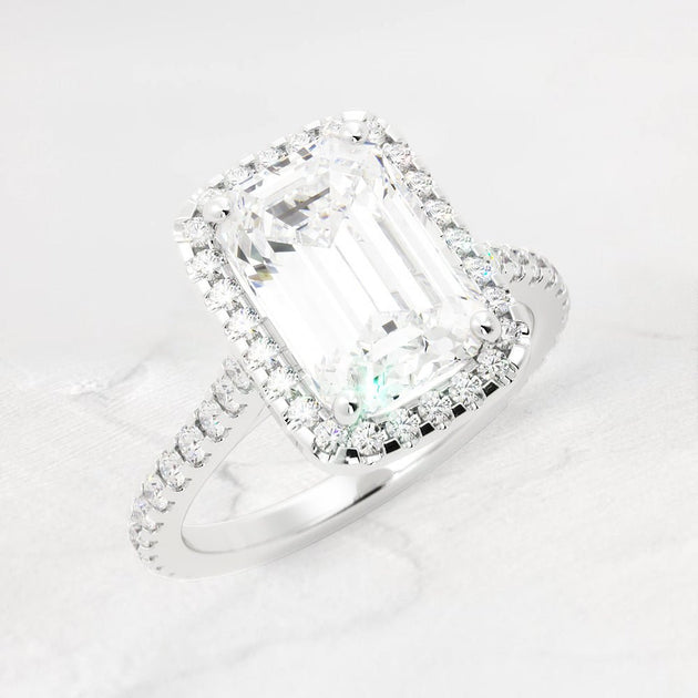 piper-emerald-cut-diamond-halo-ring-707160_1200x630.jpg?v=1710095517